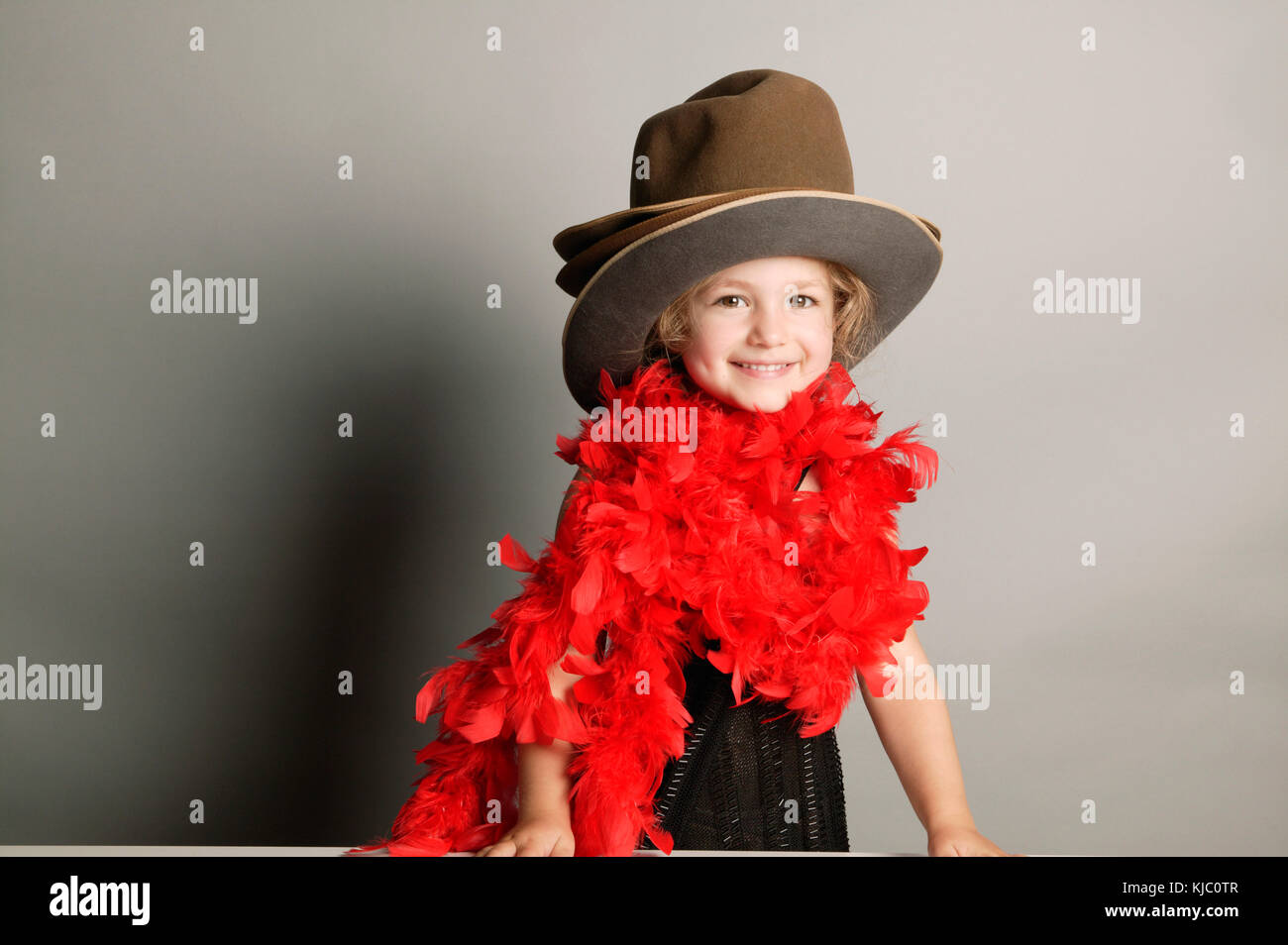 Feather boa around hi-res stock photography and images - Alamy
