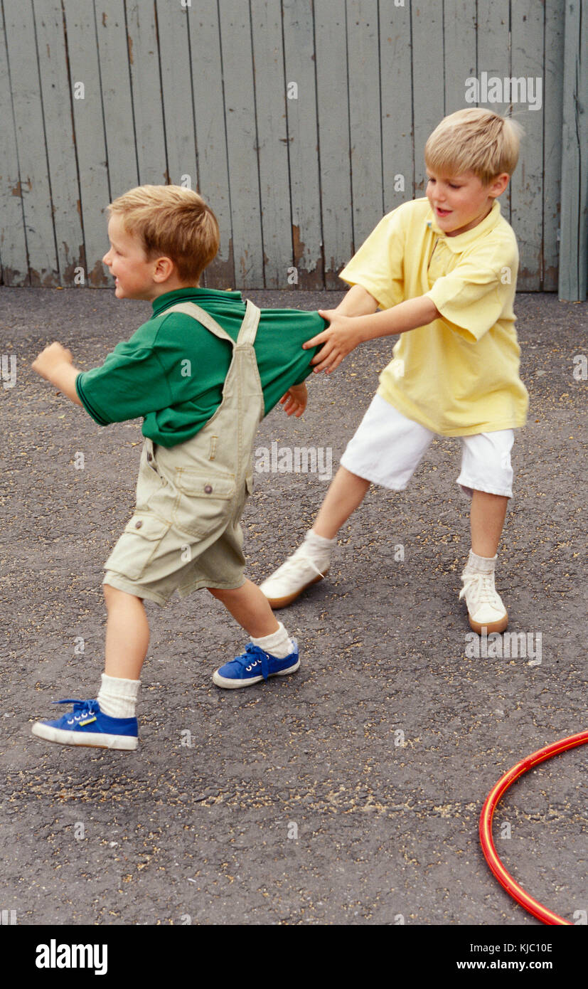 Boys Fighting Outdoors Stock Photo - Alamy