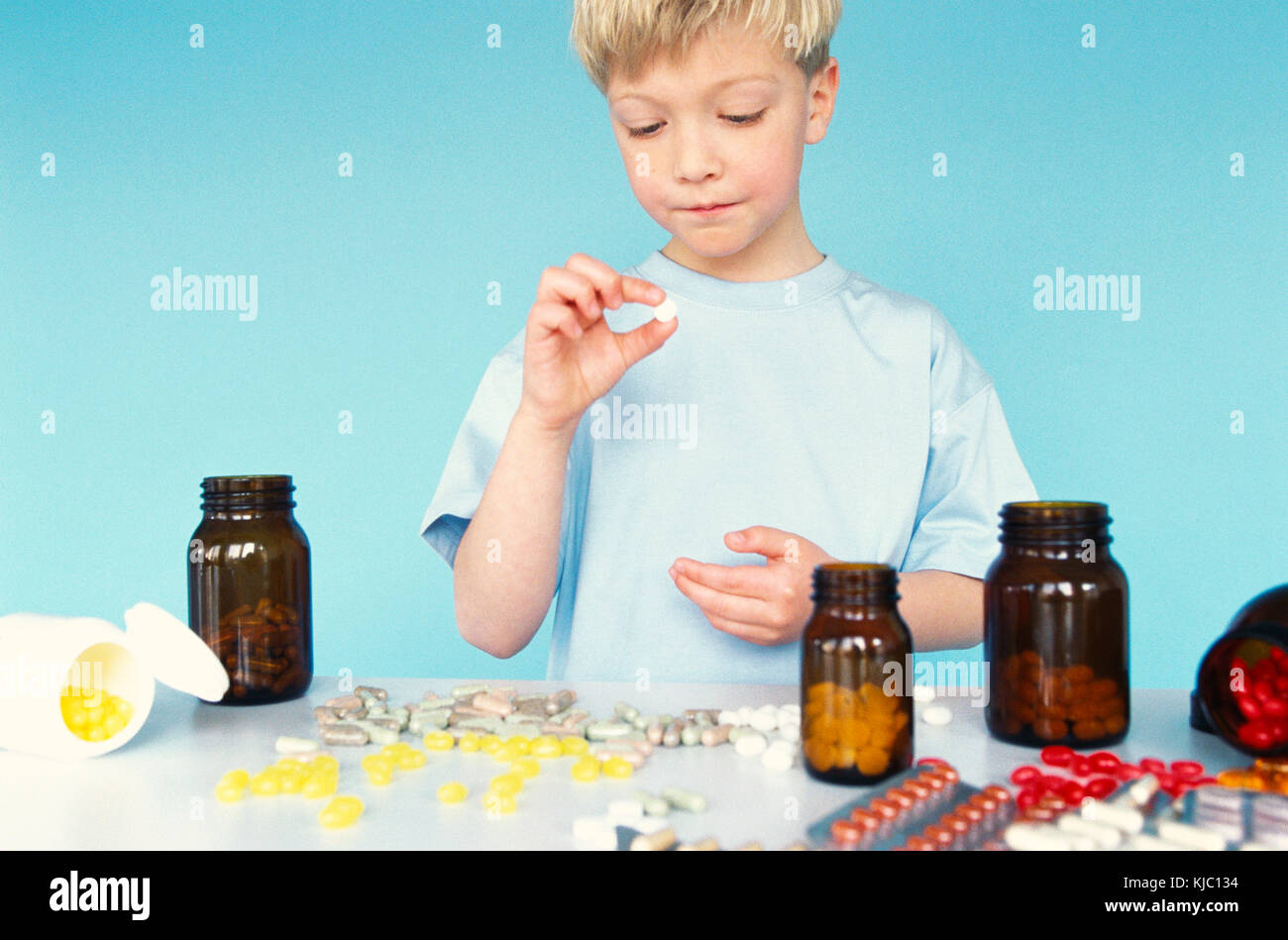 Boy with Medication Stock Photo - Alamy