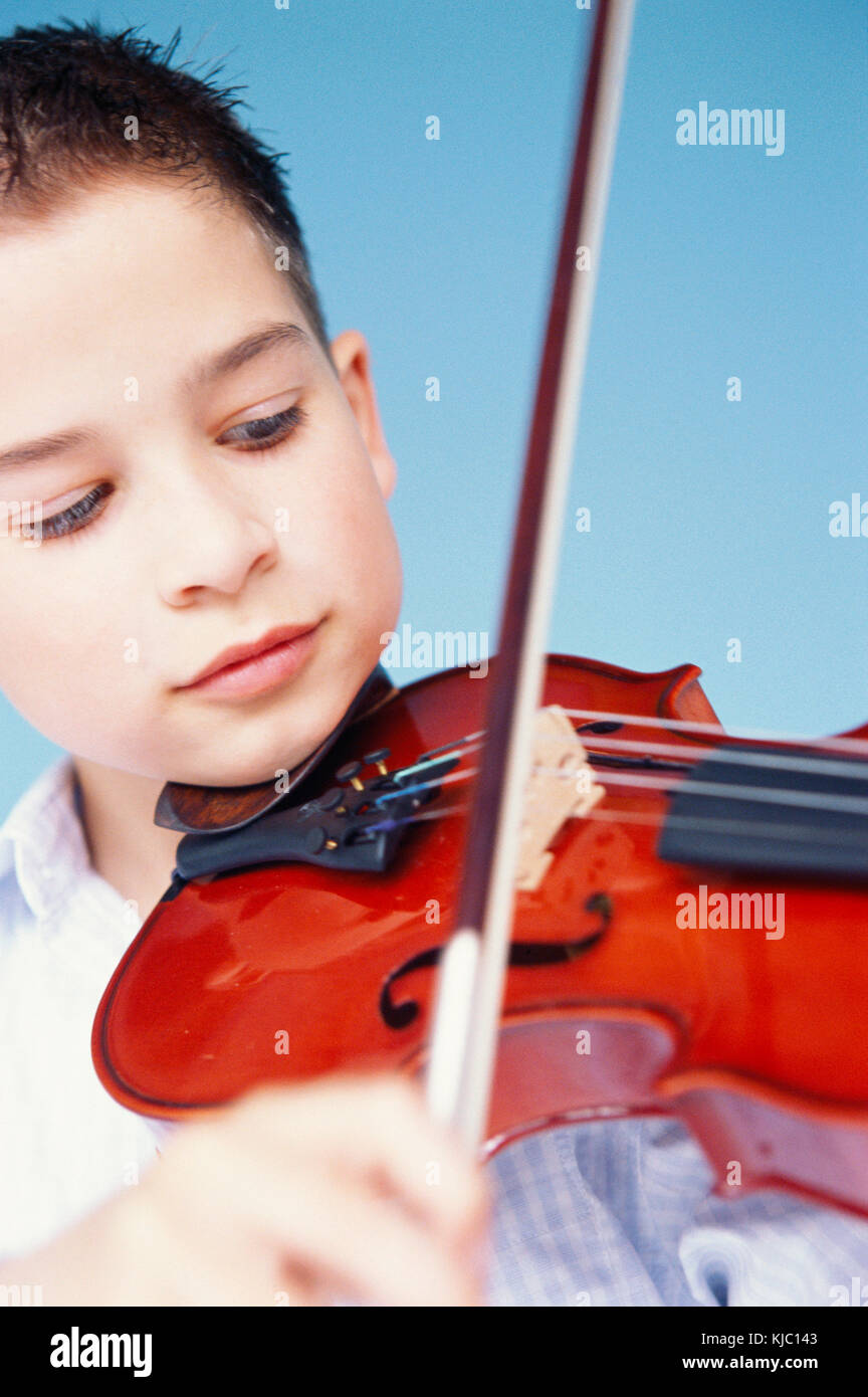 Boy Playing Violin Stock Photo - Alamy