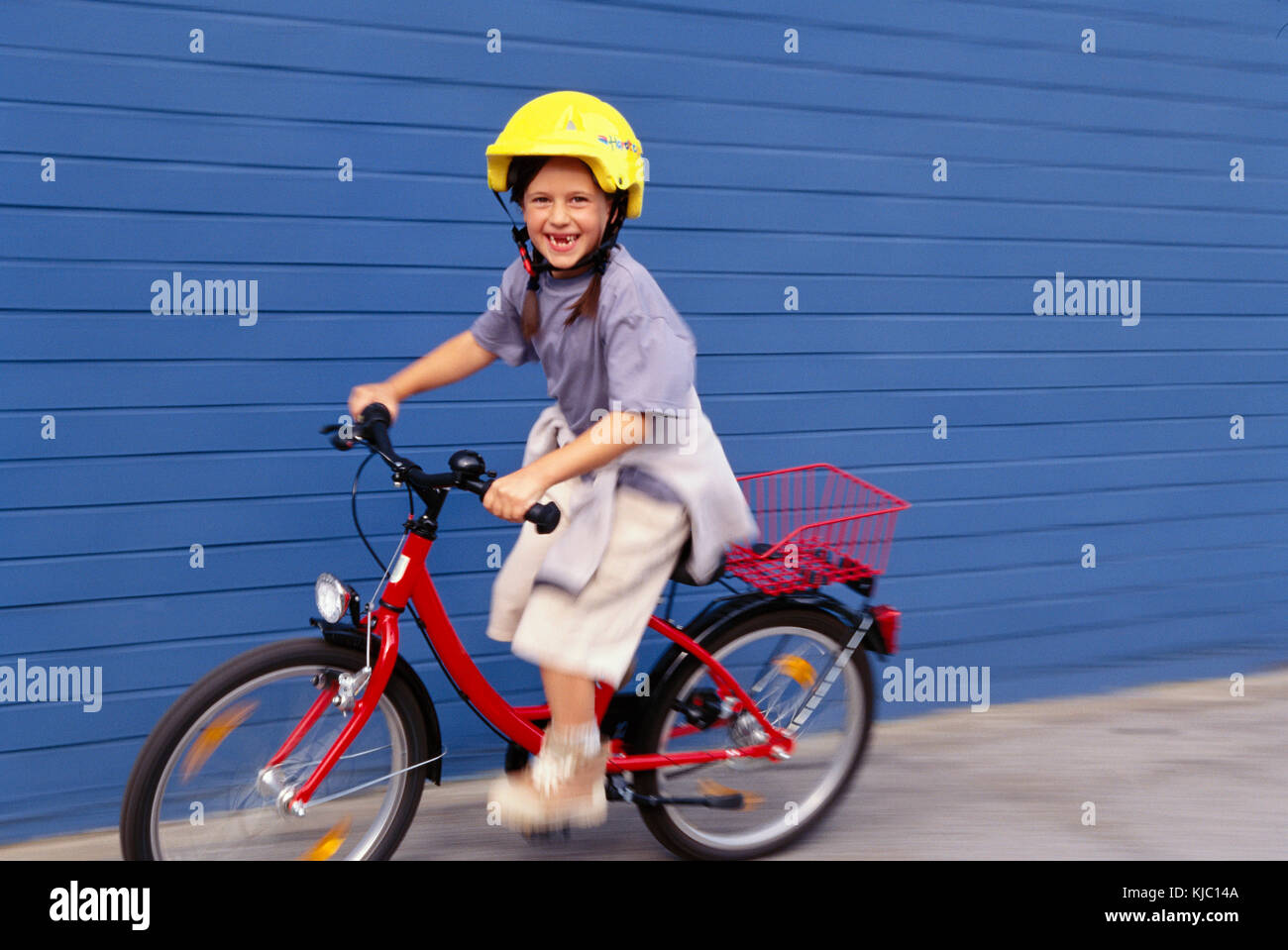 Girl Riding Bicycle Stock Photo - Alamy