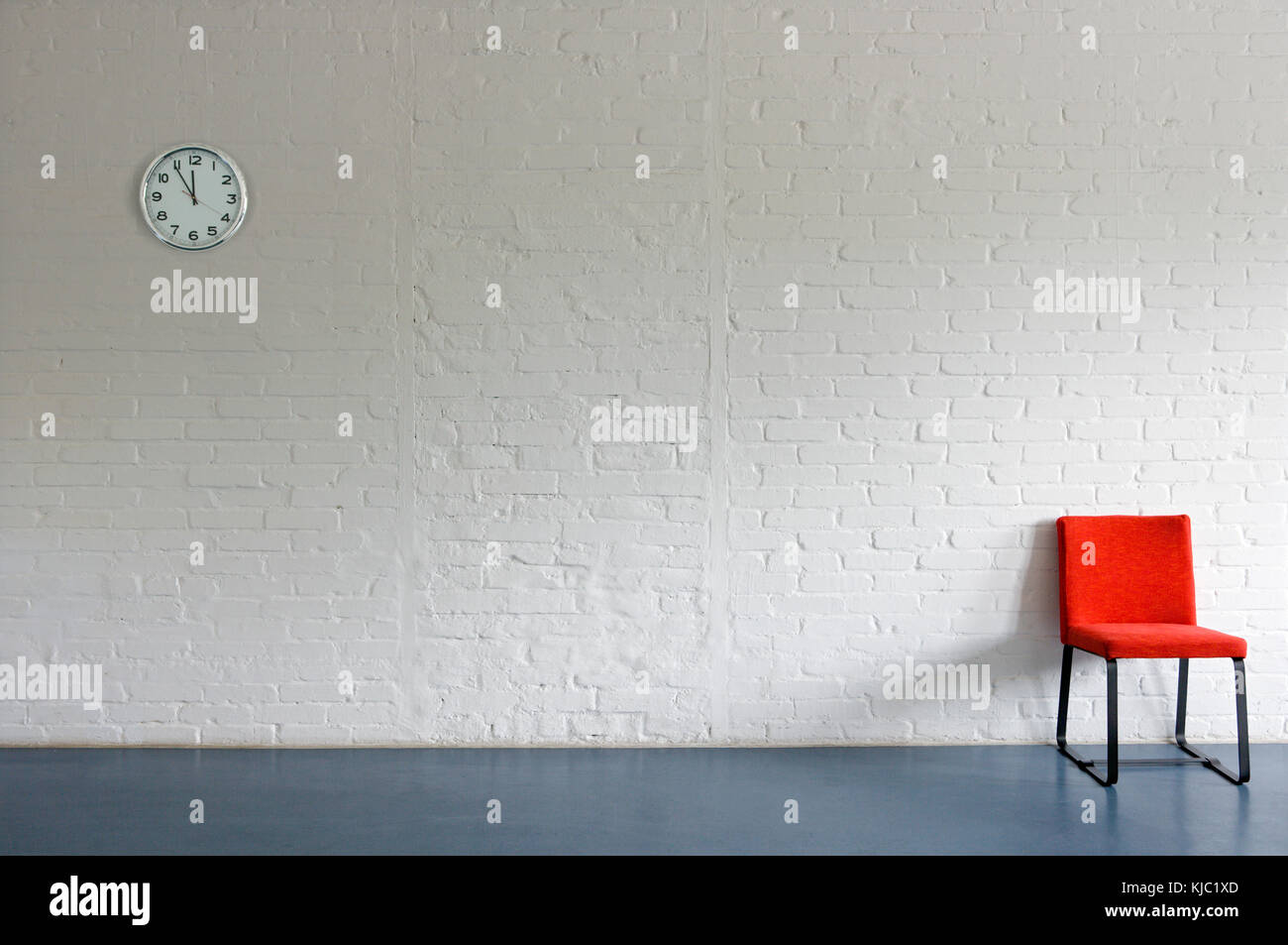 Room with Chair and Clock Stock Photo - Alamy