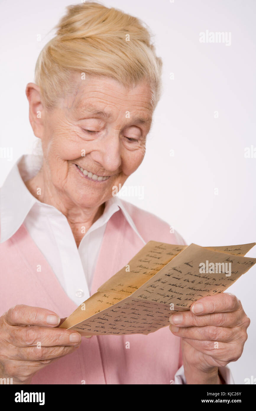 Woman Reading Letter Stock Photo - Alamy