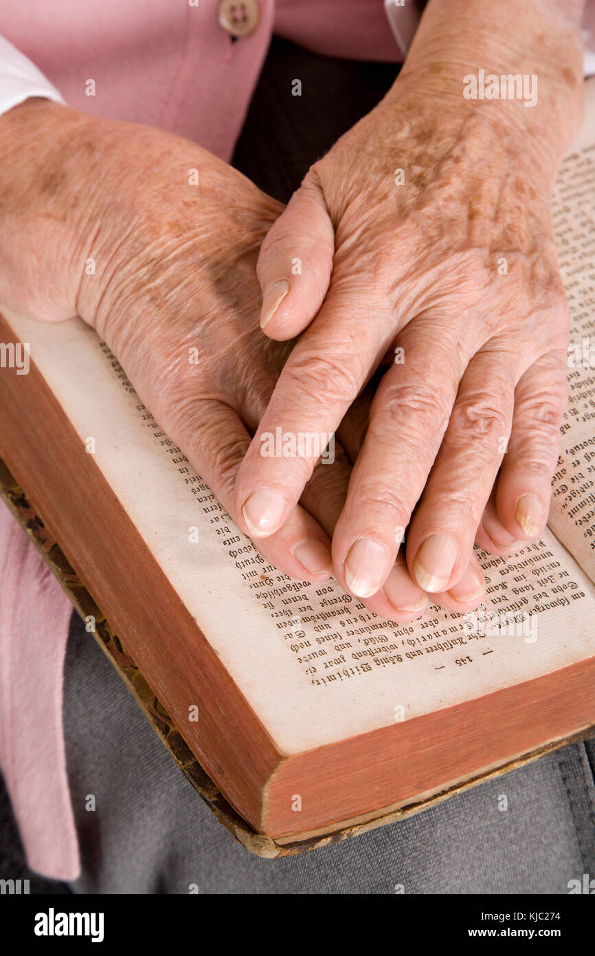 Woman's Hands on Book Stock Photo - Alamy