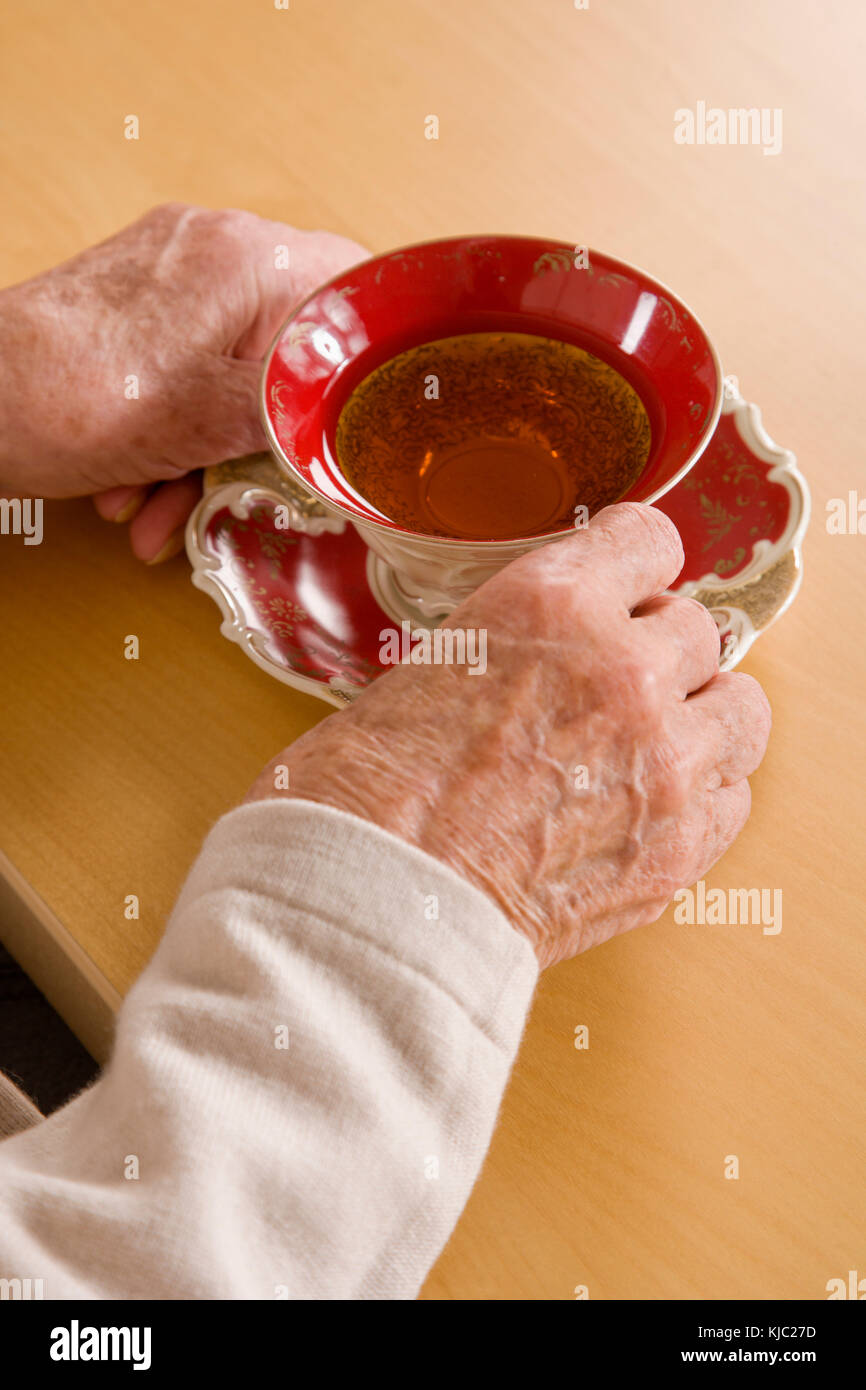 Woman's Hands with Tea Cup Stock Photo - Alamy