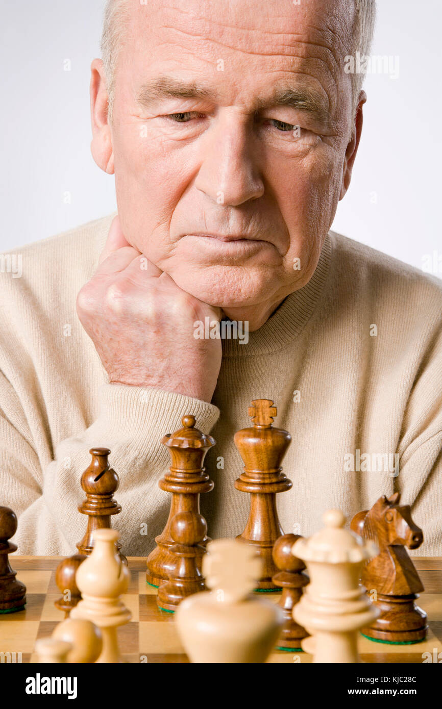 Portrait of Man Playing Chess Stock Photo - Alamy