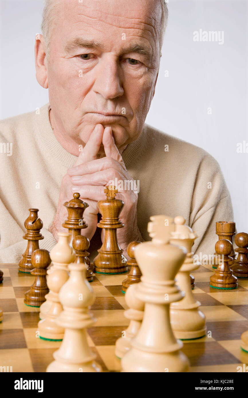 Portrait of Man Playing Chess Stock Photo - Alamy