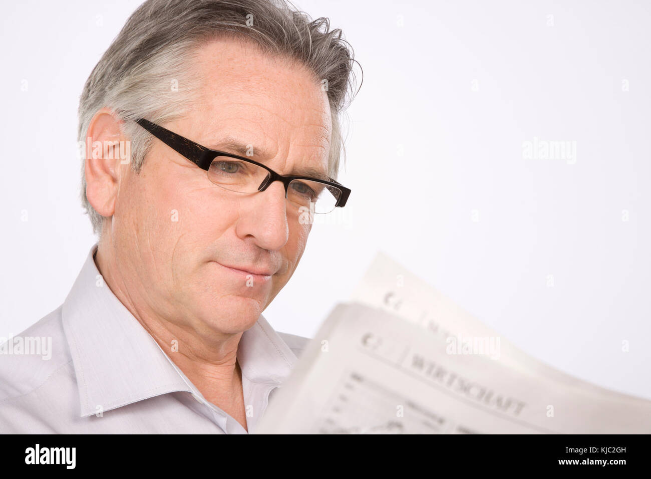 Man Reading Newspaper Stock Photo - Alamy
