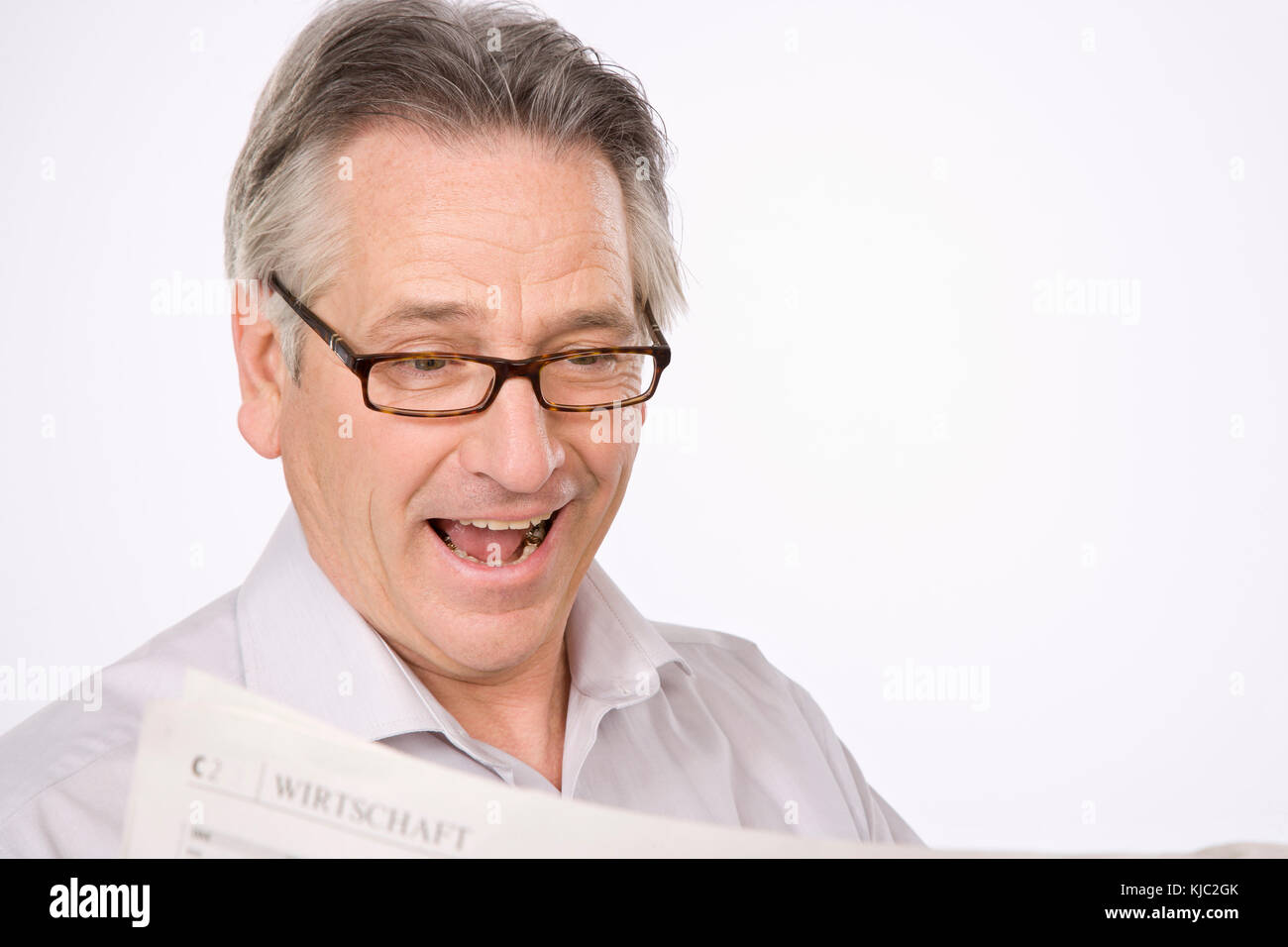 Man Reading Newspaper Stock Photo - Alamy