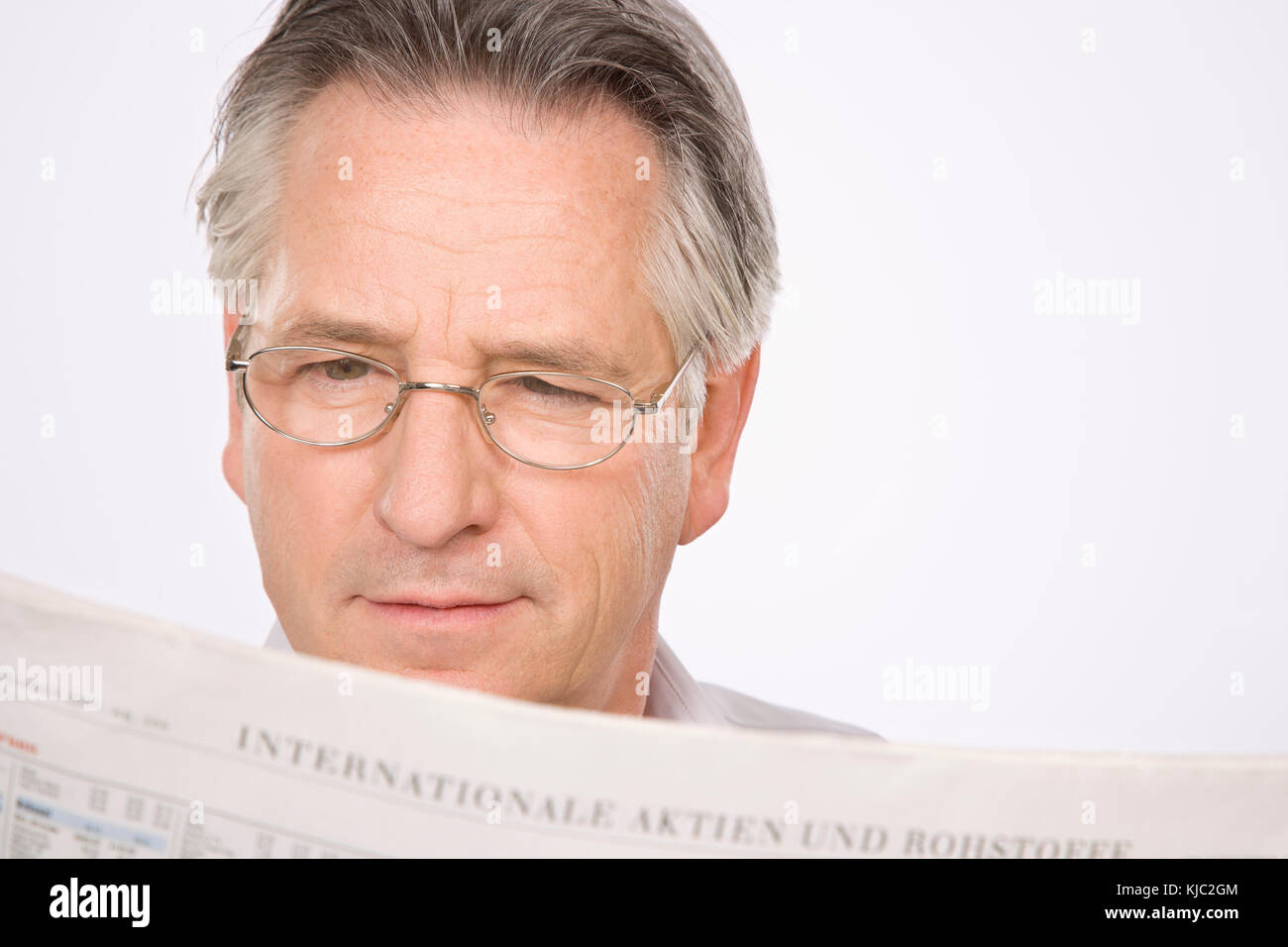 Man Reading Newspaper Stock Photo - Alamy