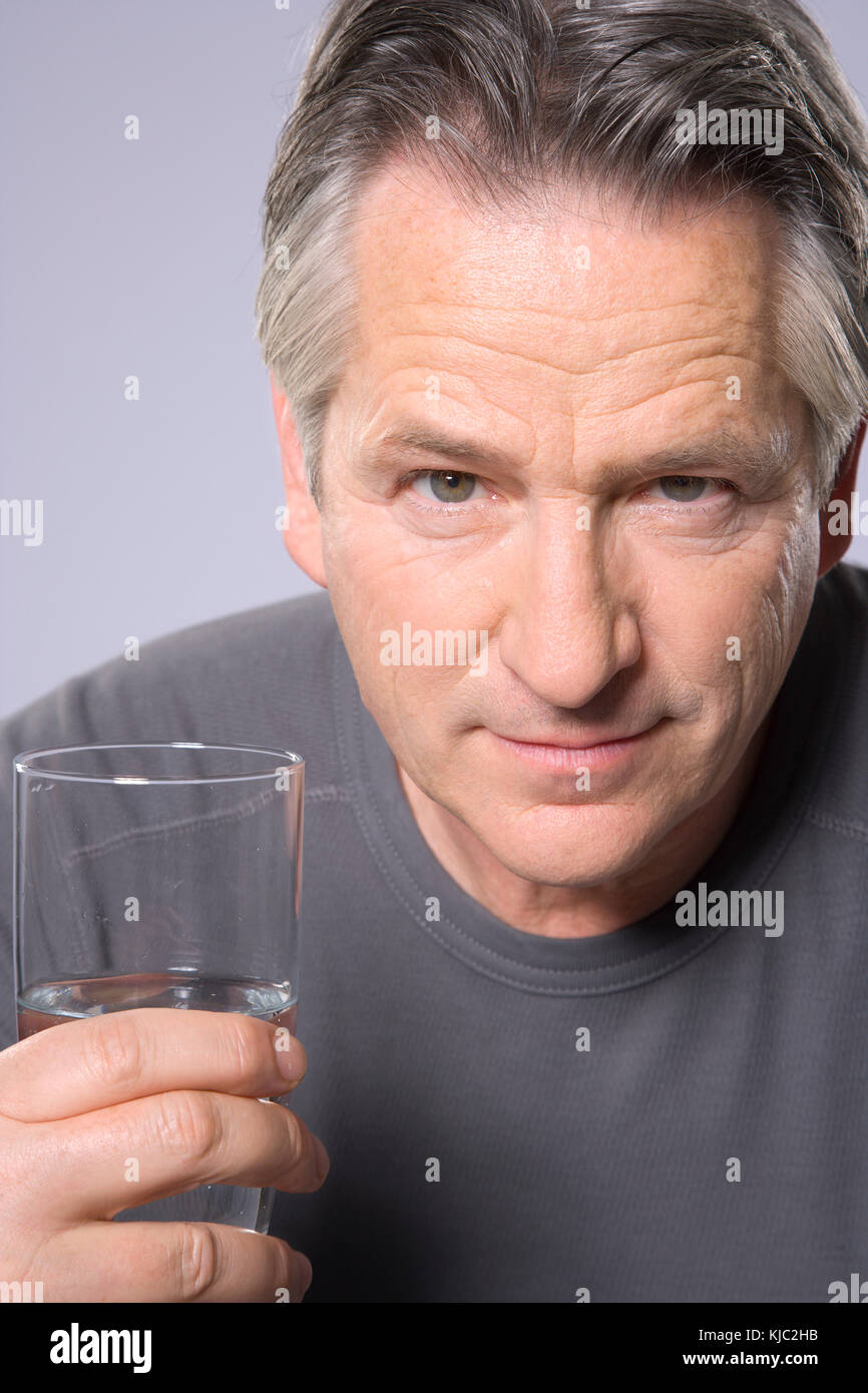Man Drinking Glass of Water Stock Photo - Alamy