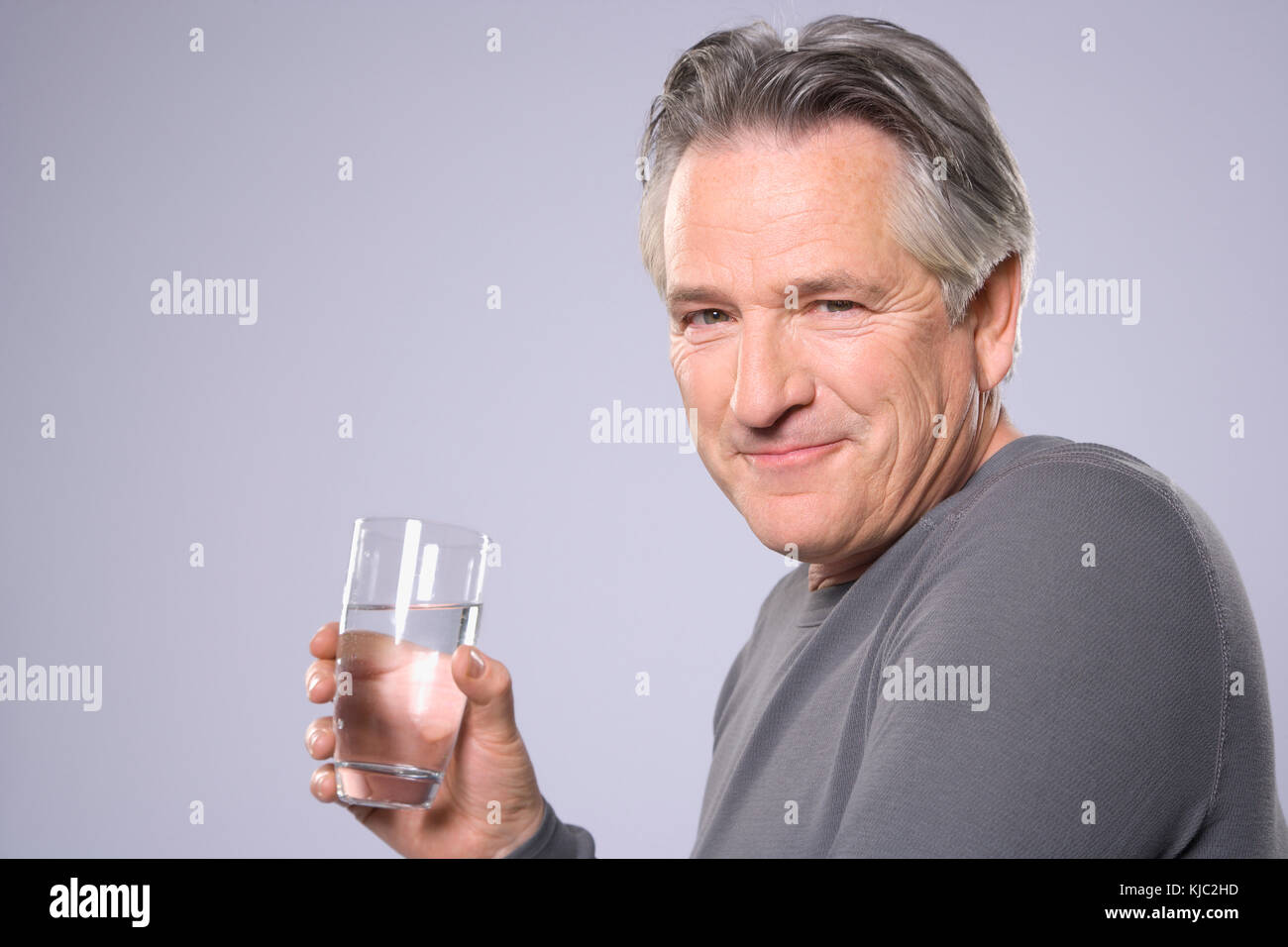 Man Drinking Glass of Water Stock Photo - Alamy