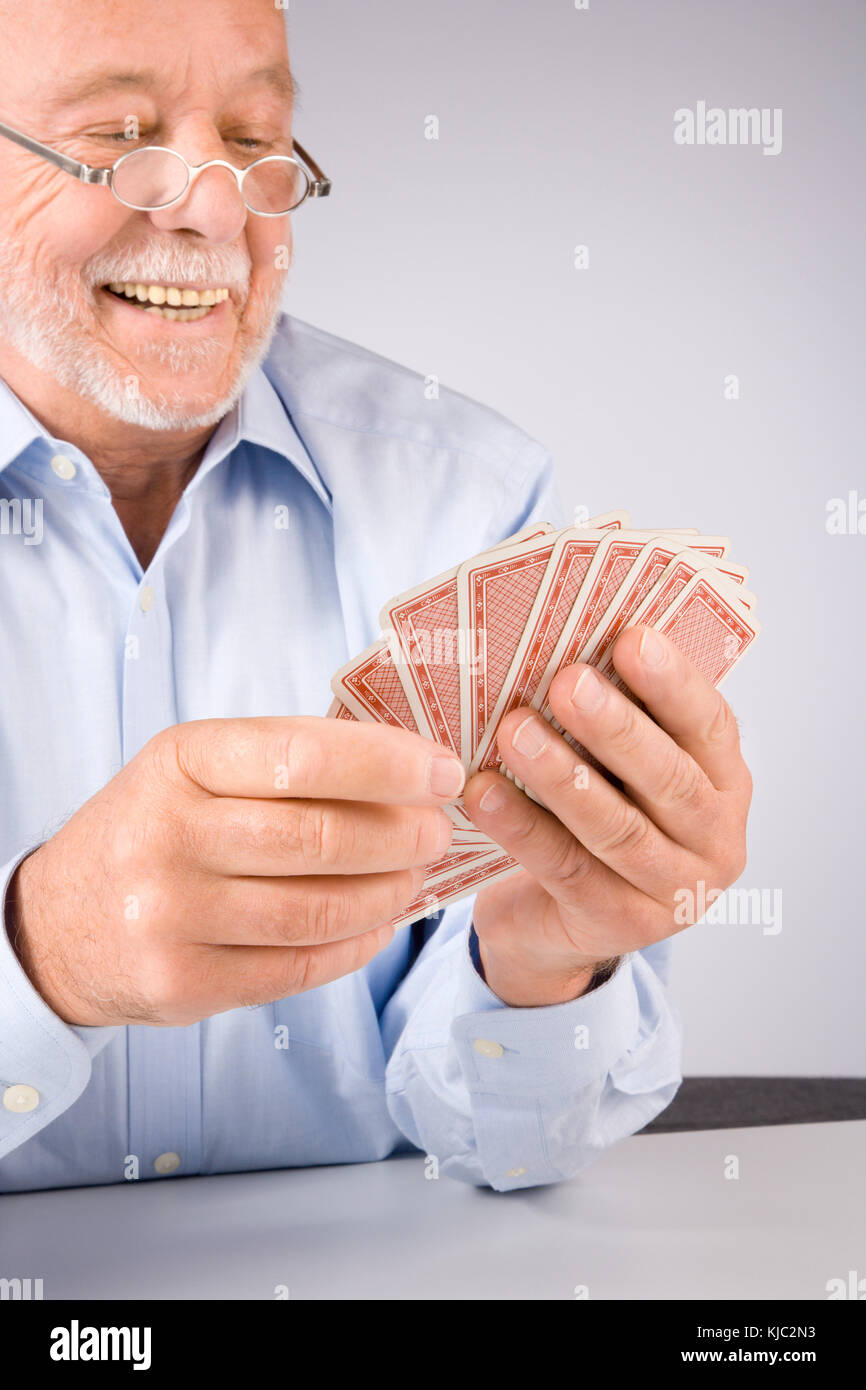 Man with Playing Cards Stock Photo - Alamy