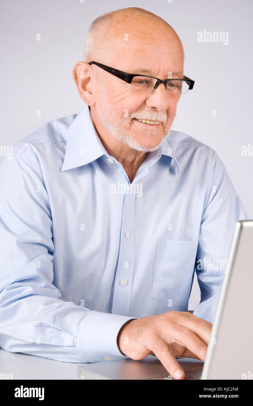 Man Using Laptop Computer Stock Photo - Alamy