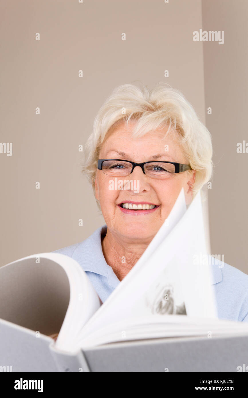 Portrait of Woman Reading Book Stock Photo - Alamy
