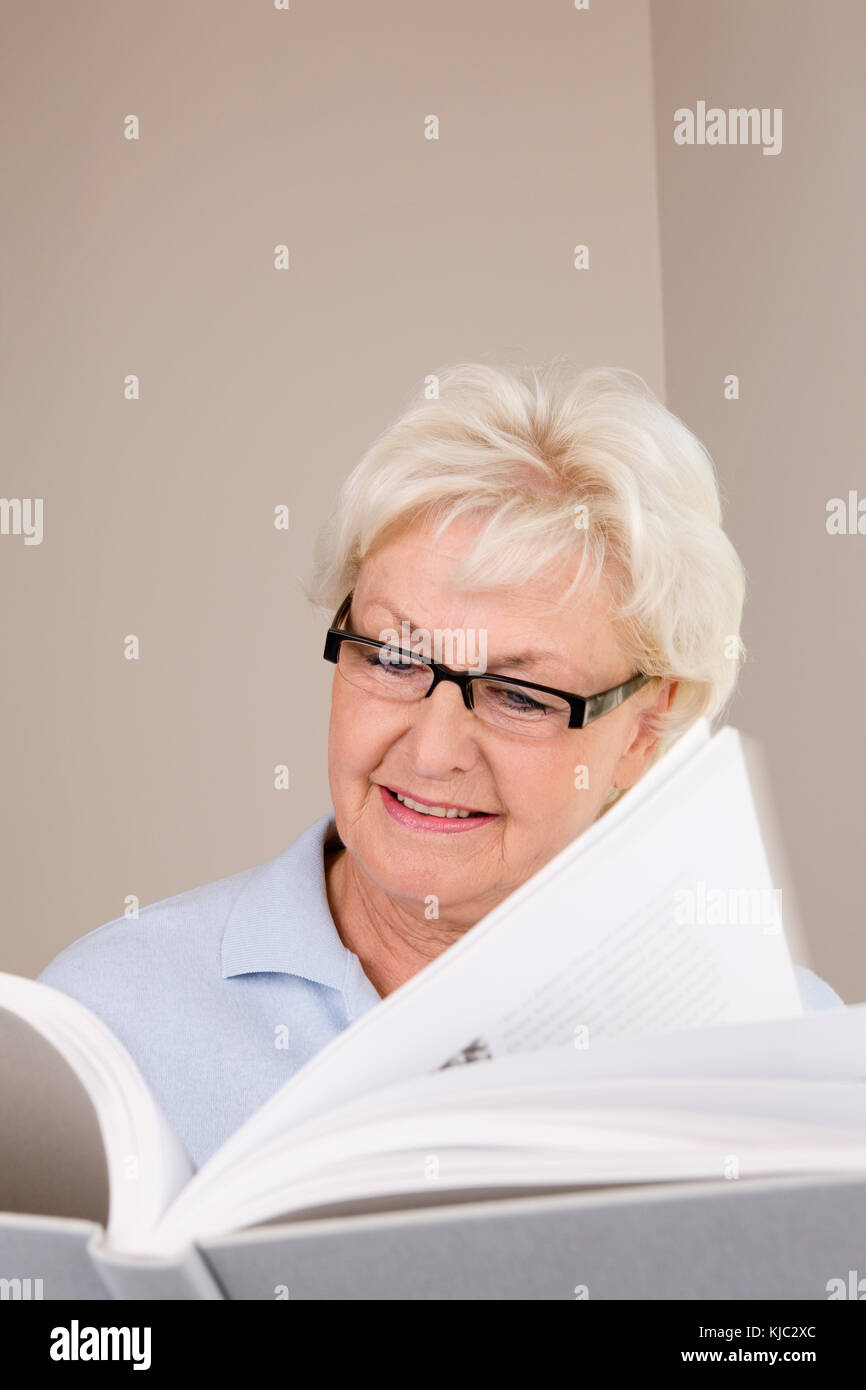 Portrait of Woman Reading Book Stock Photo - Alamy