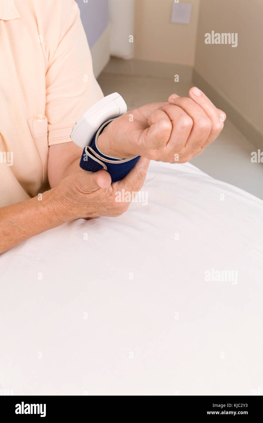 Woman Measuring Pulse Stock Photo - Alamy