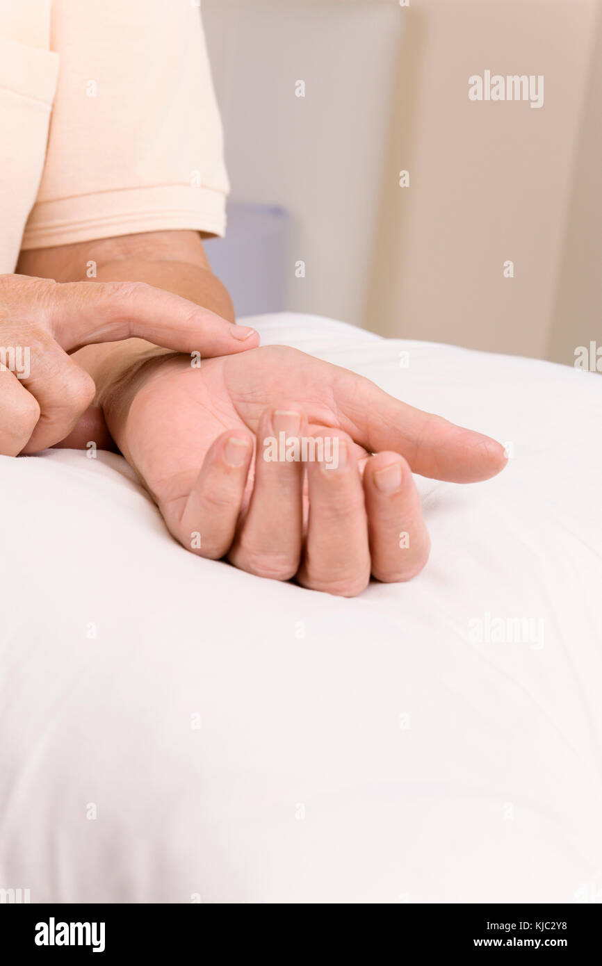 Woman Measuring Pulse Stock Photo - Alamy