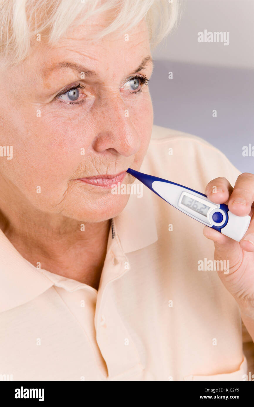 Woman Taking Temperature Stock Photo - Alamy