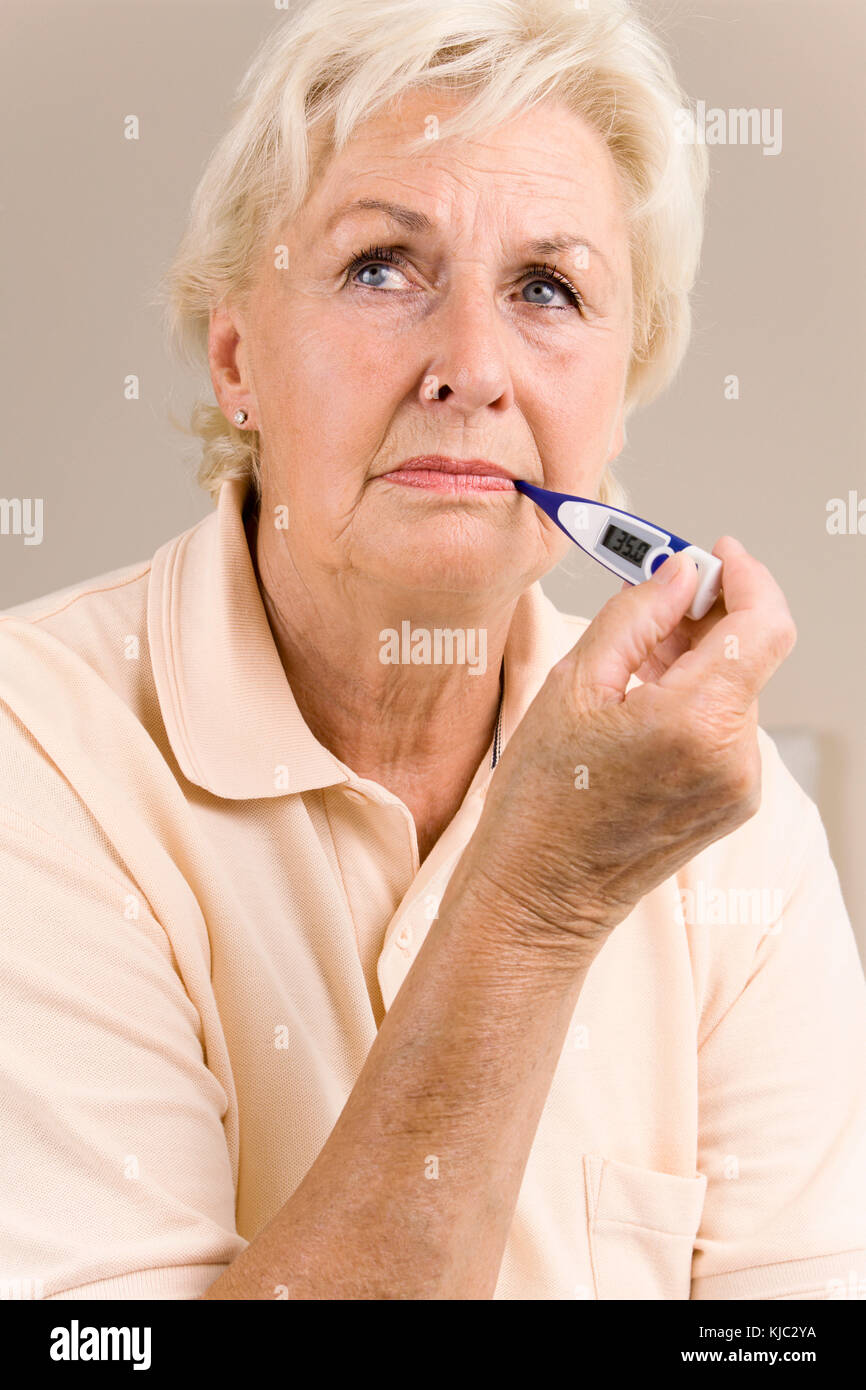 Woman Taking Temperature Stock Photo - Alamy
