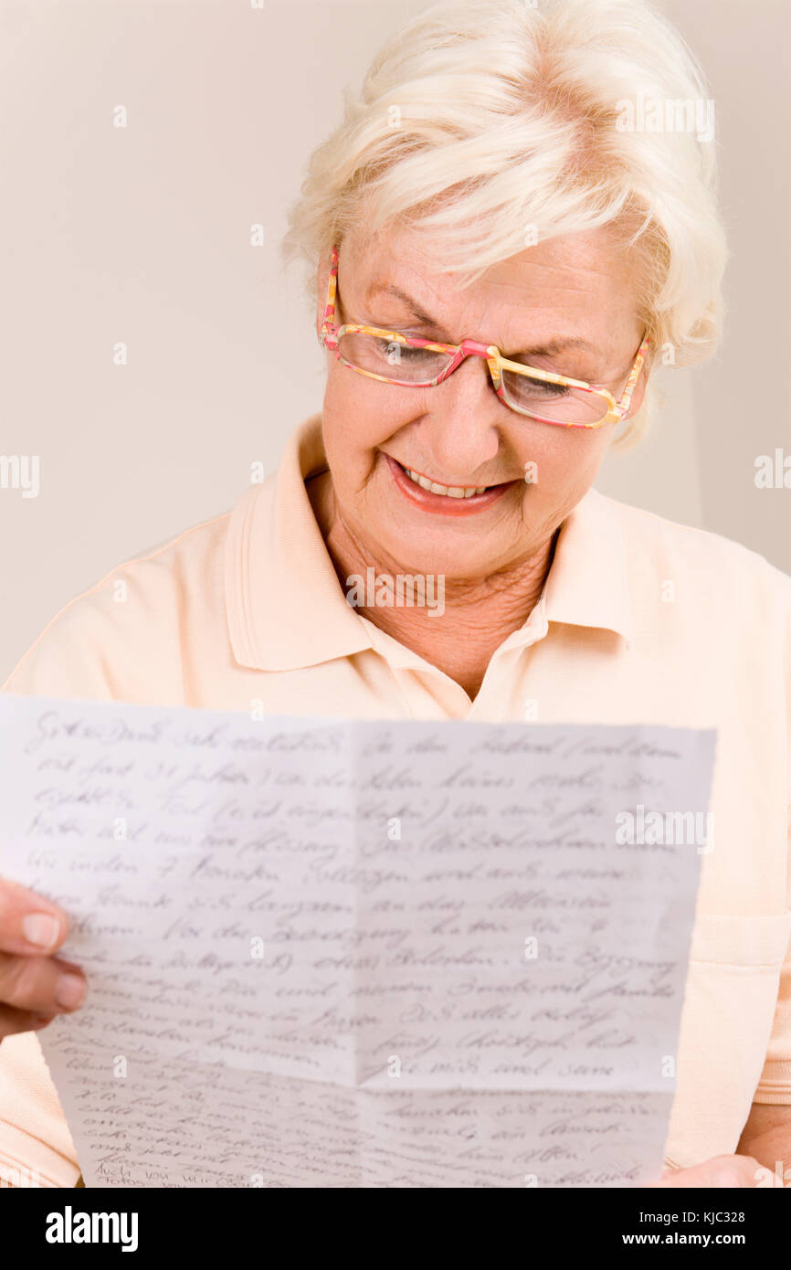 Woman Reading Letter Stock Photo - Alamy