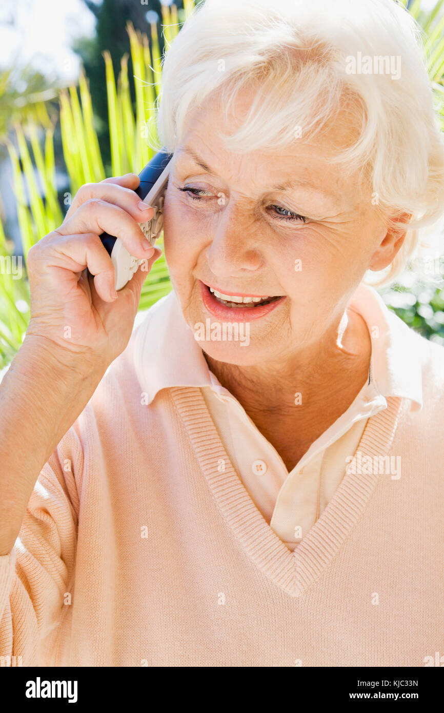 Woman Using Cell Phone Stock Photo - Alamy