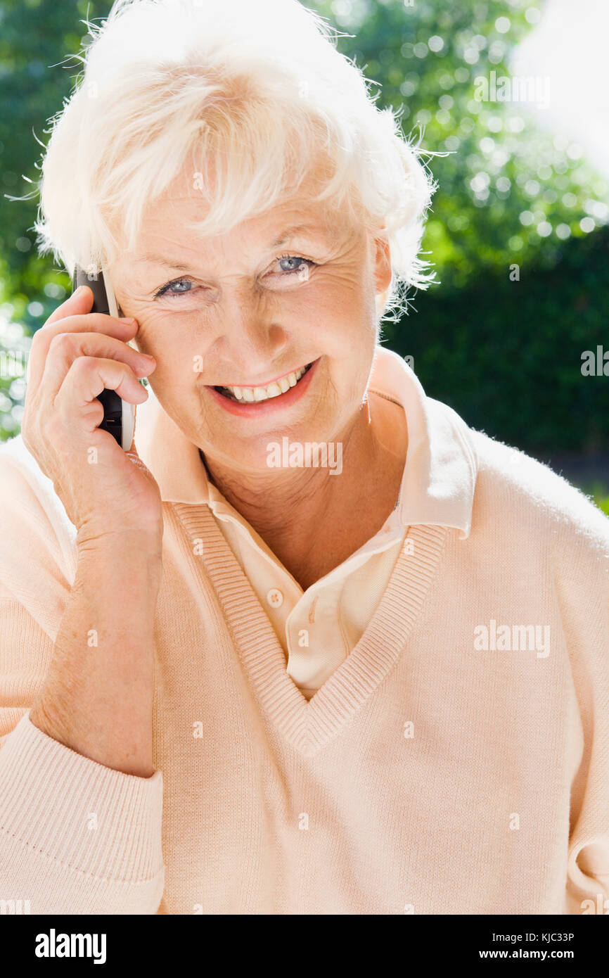 Woman Using Cell Phone Stock Photo - Alamy