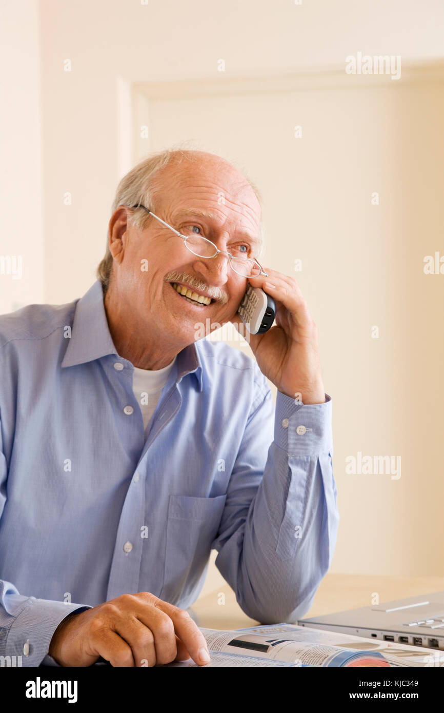 Man Ordering From Catalogue Stock Photo - Alamy