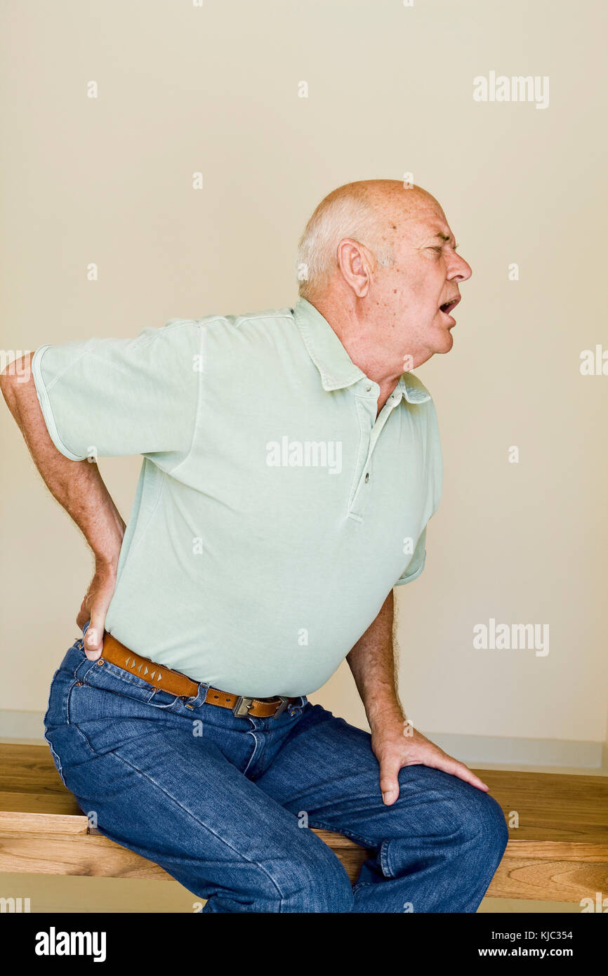 Man with Back Pain Stock Photo - Alamy
