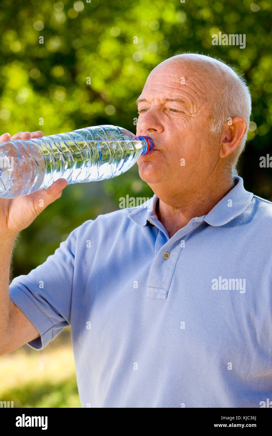 Man Drinking Bottled Water Stock Photo - Alamy