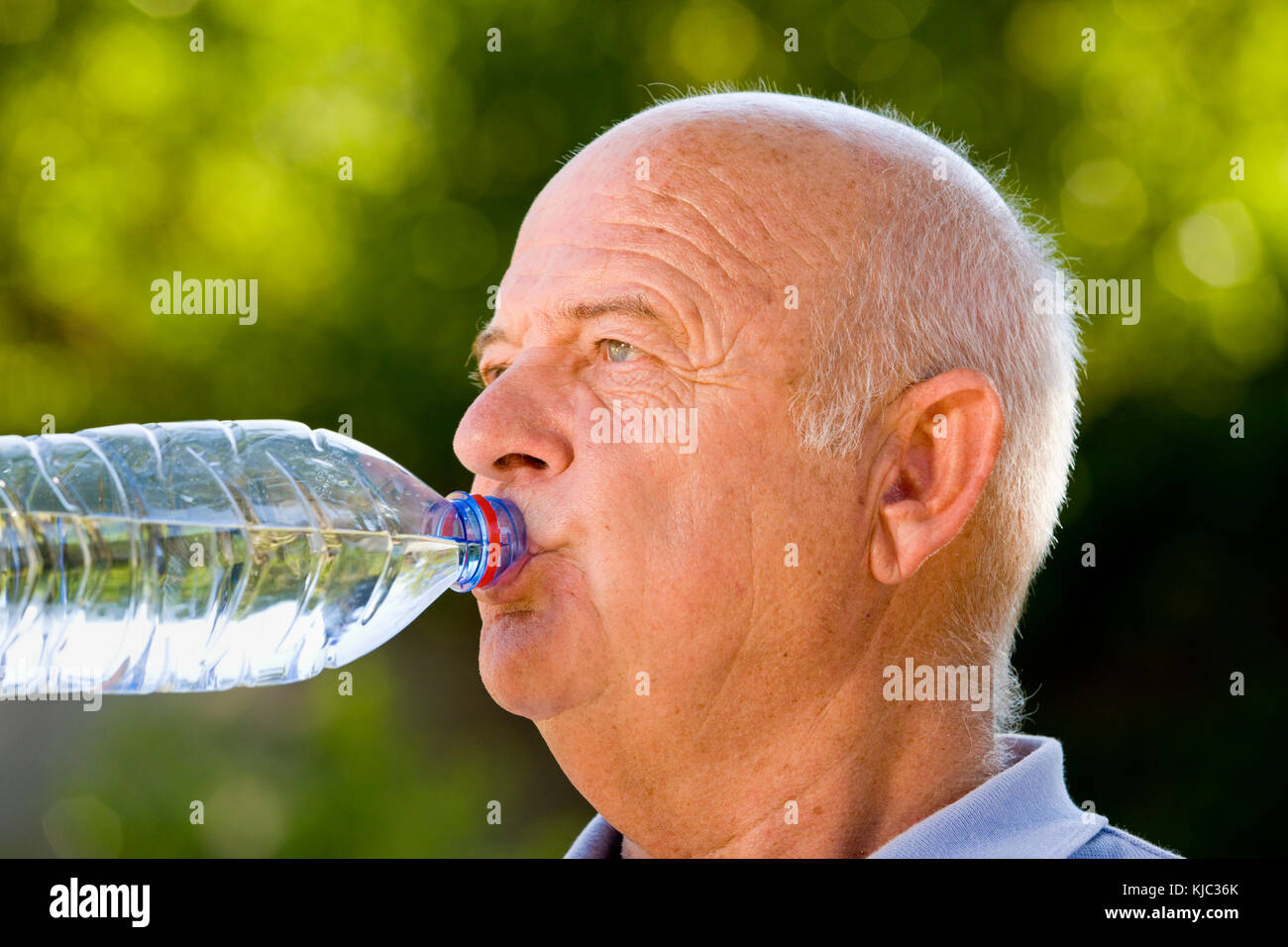 Man Drinking Bottled Water Stock Photo - Alamy
