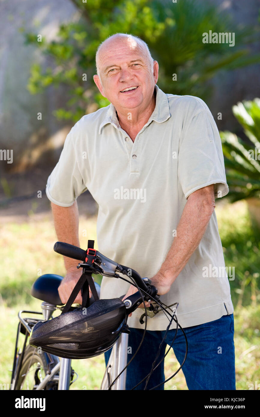 Portrait of Man With Bike Stock Photo - Alamy