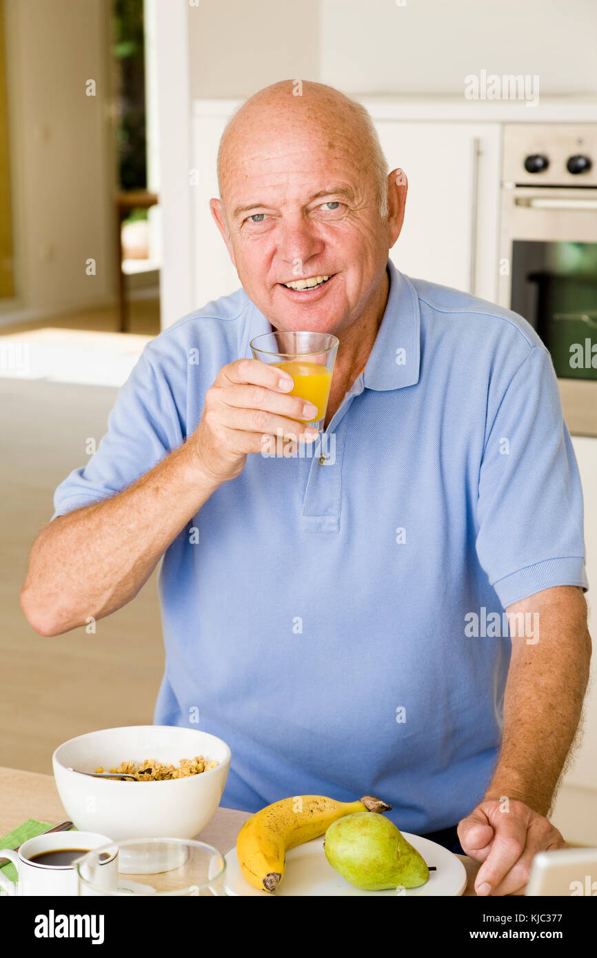 Portrait of Man Eating Breakfast Stock Photo - Alamy