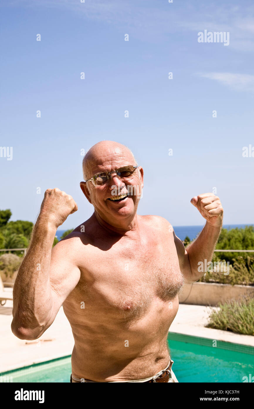 Man swimming pool outdoors muscles hi-res stock photography and images ...