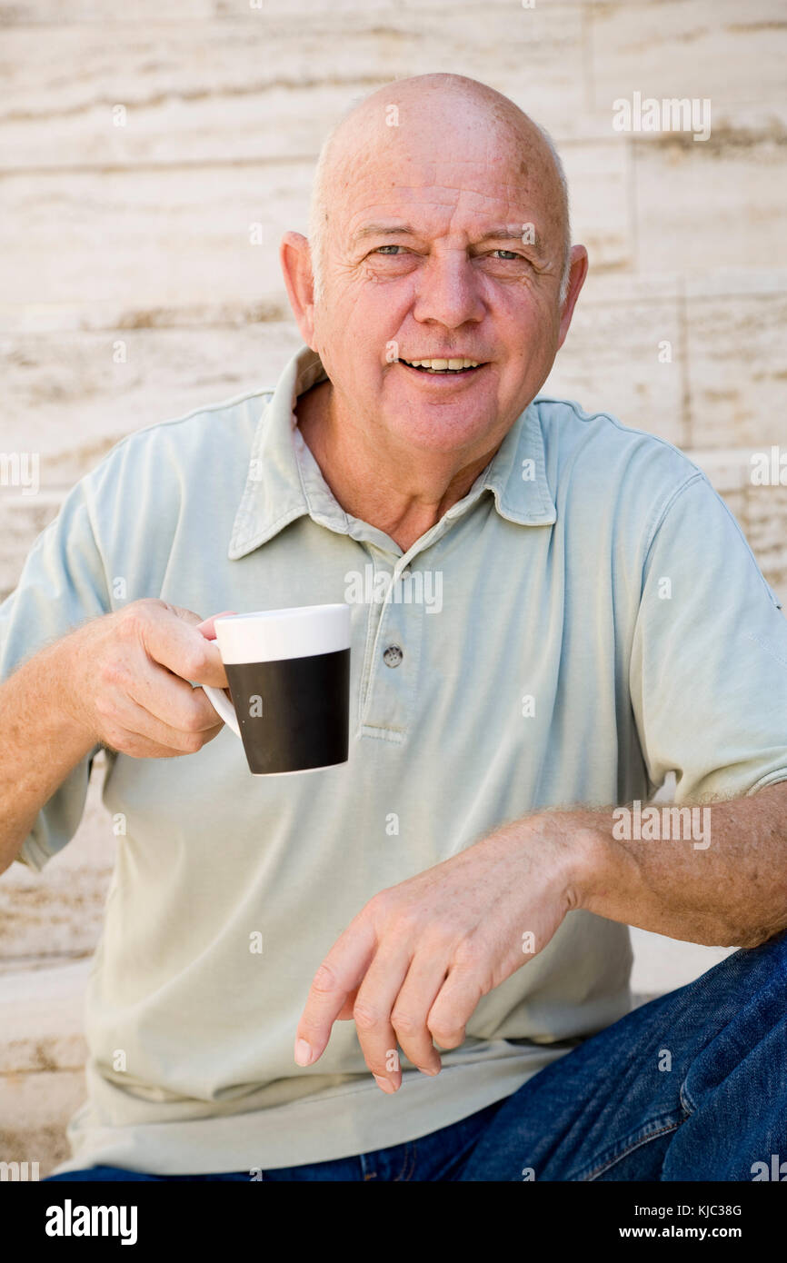 Portrait of Man Drinking Coffee Stock Photo - Alamy
