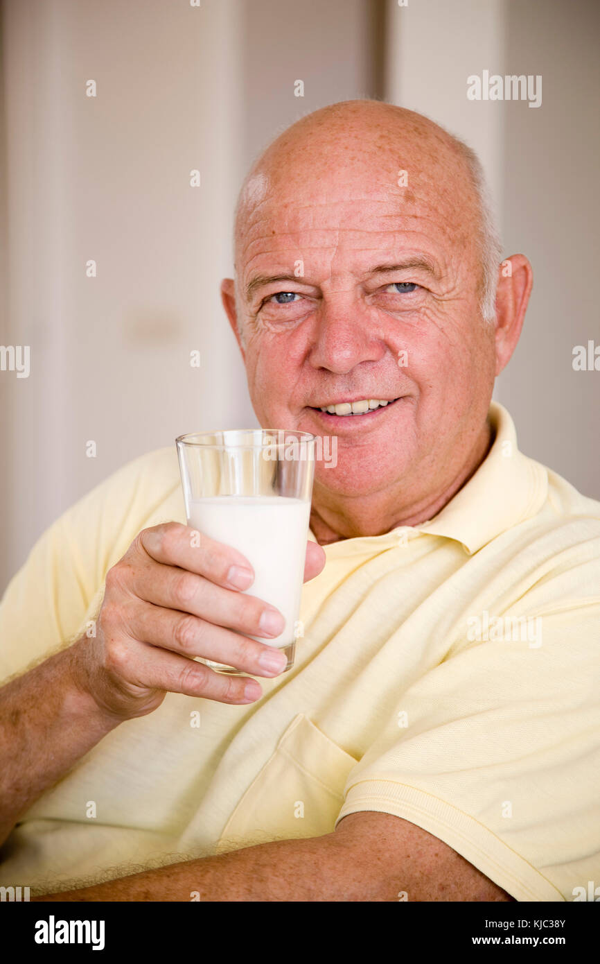 Man Drinking Glass of Milk Stock Photo - Alamy