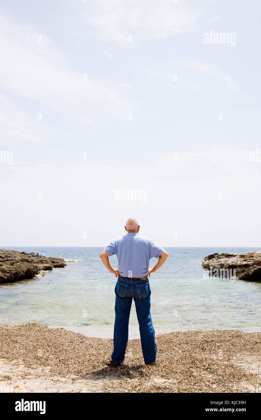 Man Looking Out to Sea Stock Photo - Alamy
