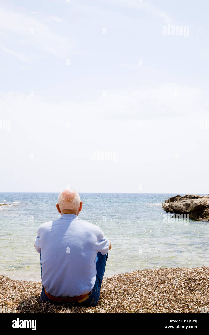 Man Looking Out to Sea Stock Photo - Alamy