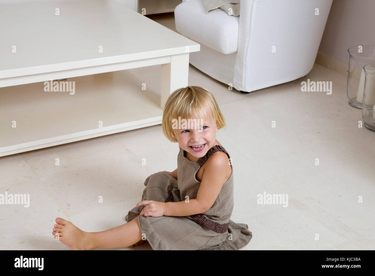 Happy Little Girl at Home Stock Photo - Alamy