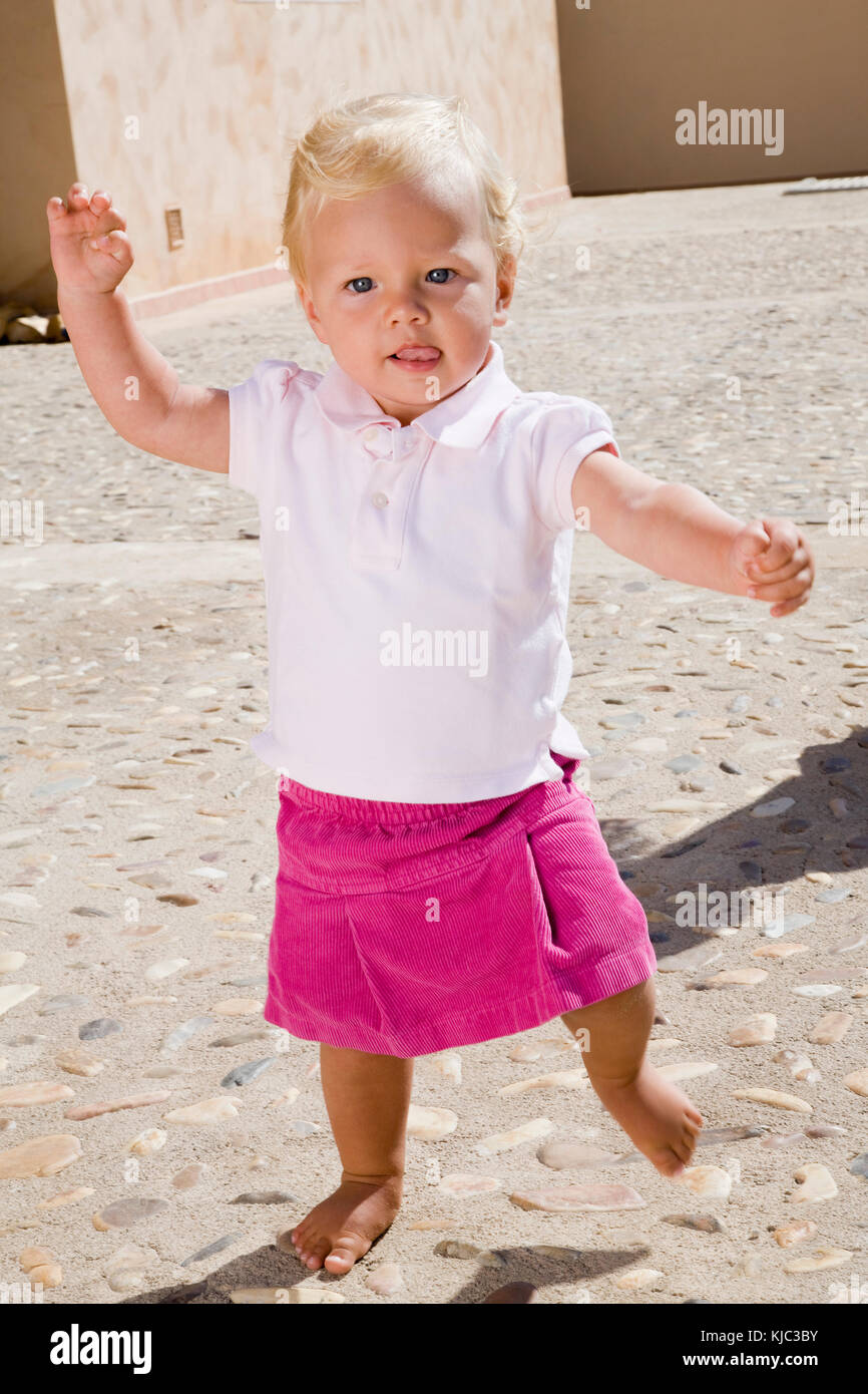 Toddler Learning to Walk Stock Photo - Alamy