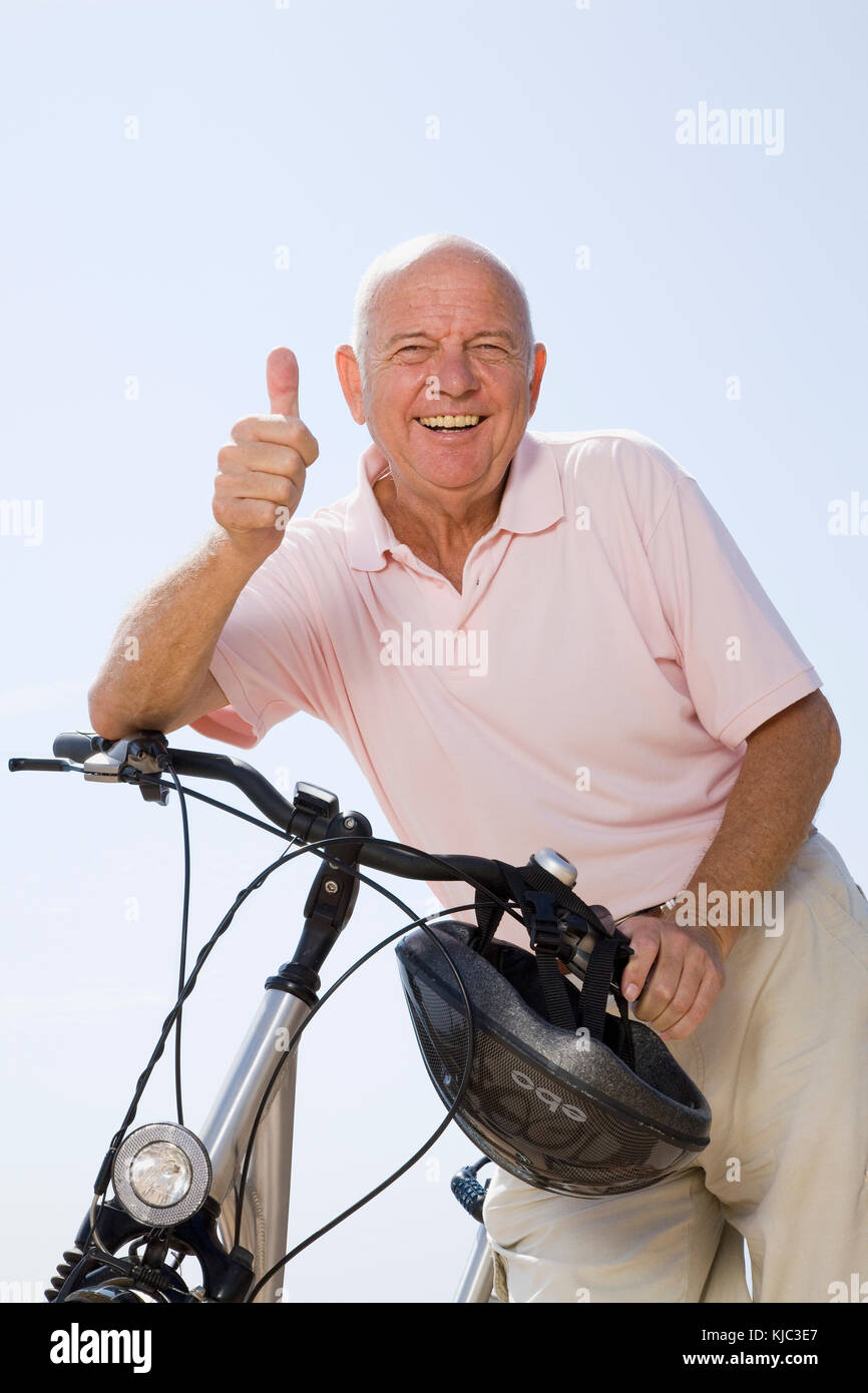 Man with Bicycle Giving Thumbs Up Stock Photo - Alamy