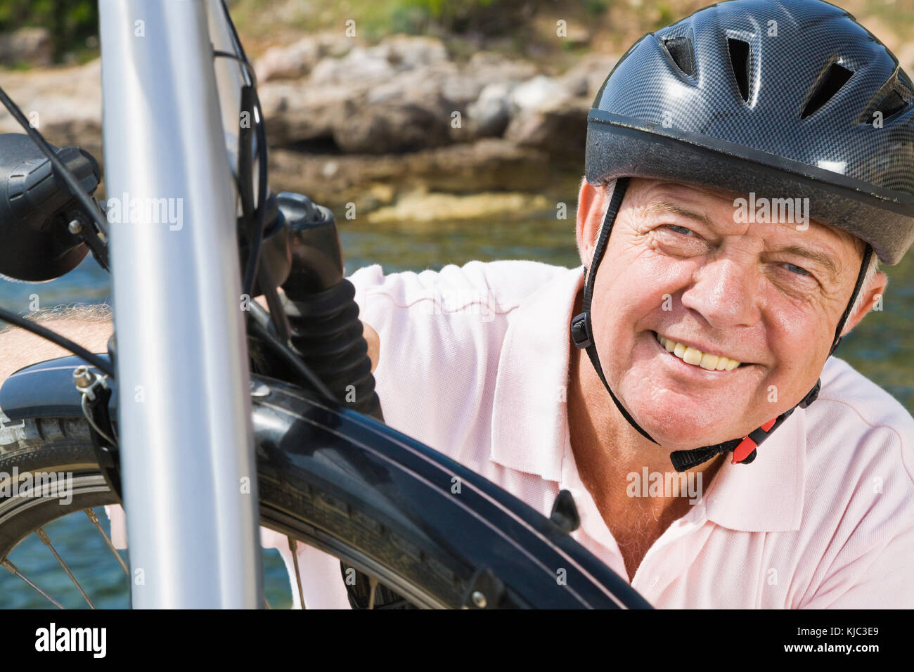 Man Working on Bicycle Stock Photo - Alamy