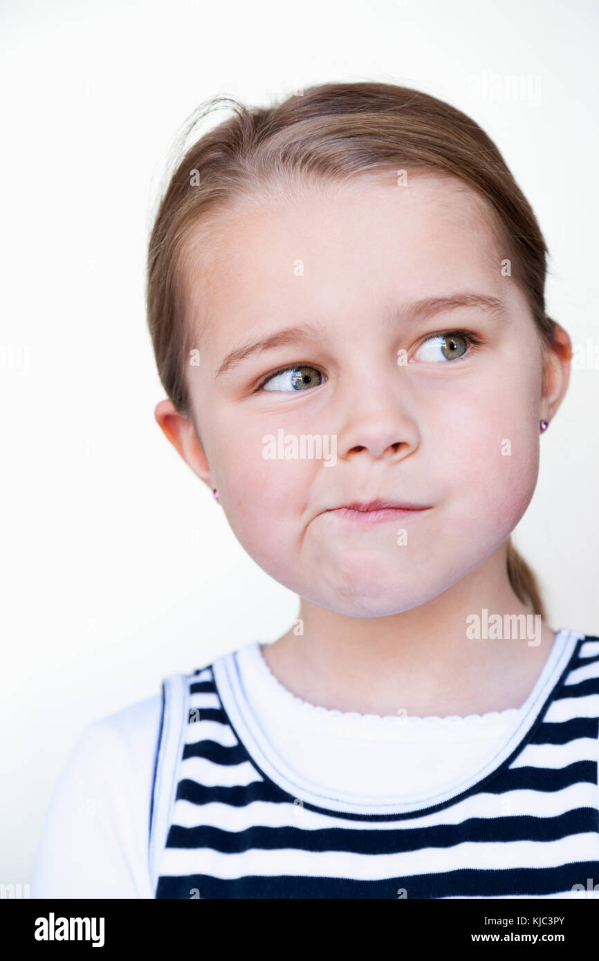 Portrait of Girl Thinking Stock Photo - Alamy
