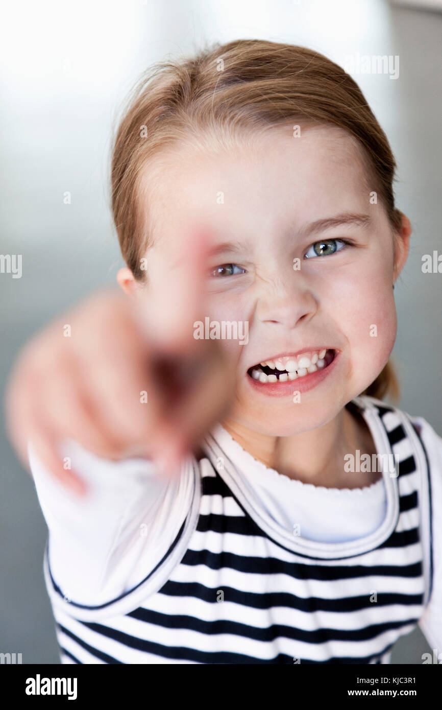 Angry Girl Pointing Stock Photo - Alamy