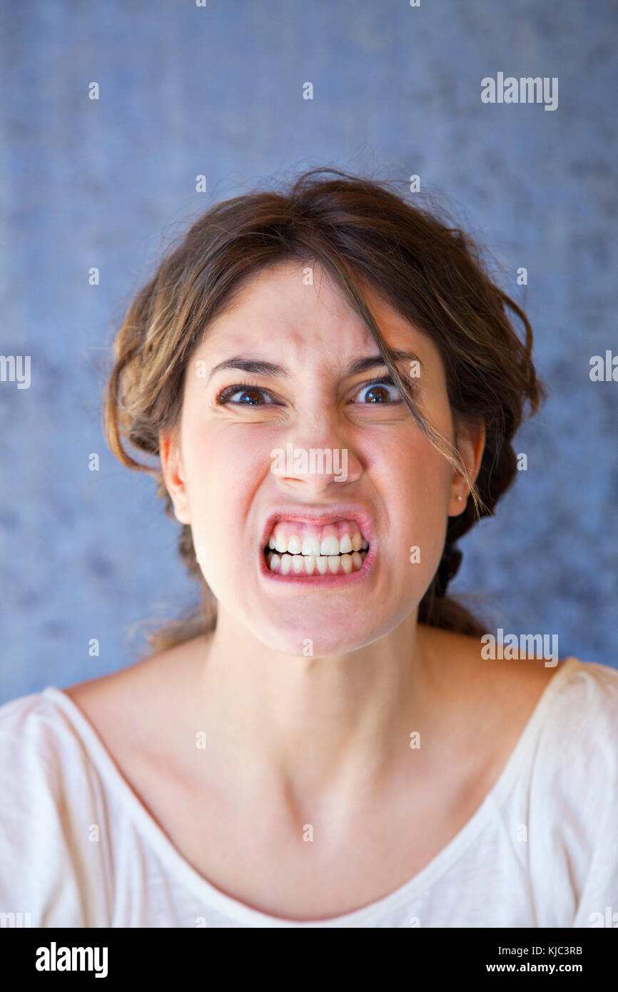 Angry Woman in Studio Stock Photo - Alamy