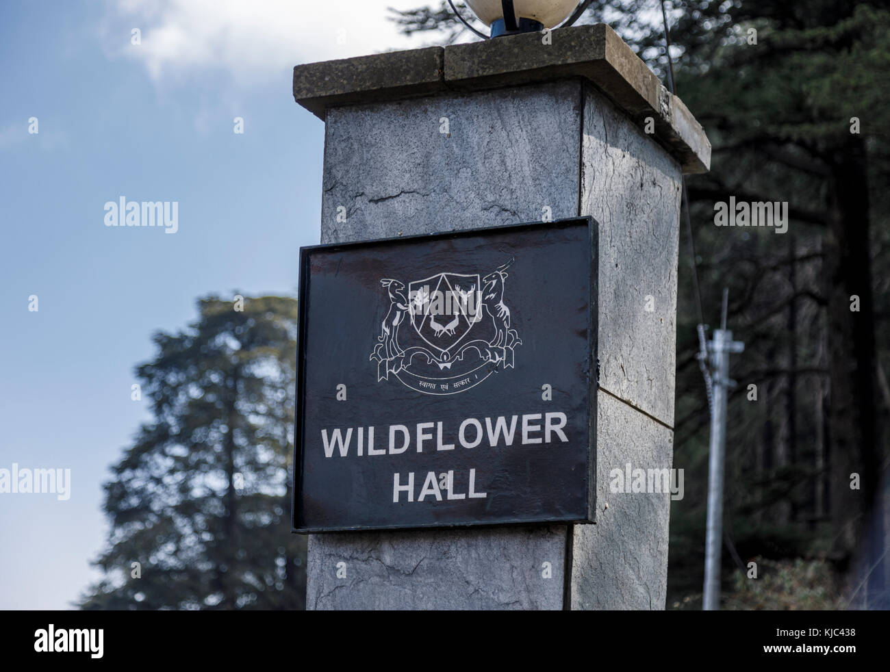 Sign at the entrance to the deluxe Oberai Wildflower Hall Hotel ...
