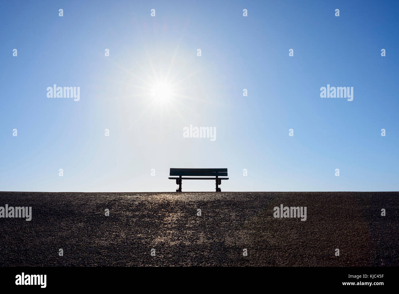 Bench on Dike with Sun by North Sea, Westkapelle, Zeeland, Netherlands ...