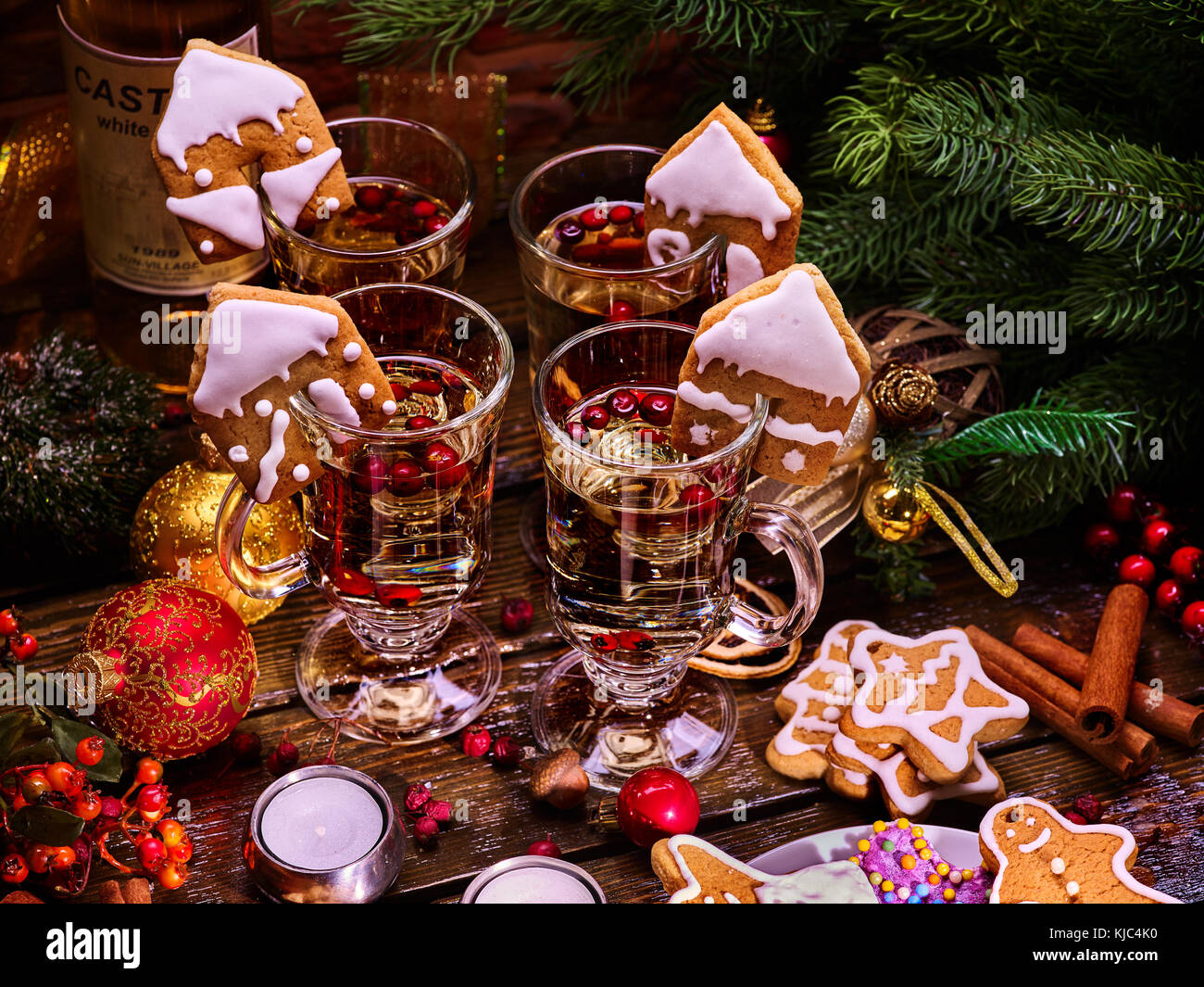 Christmas table decorations with glasses of punch Stock Photo - Alamy