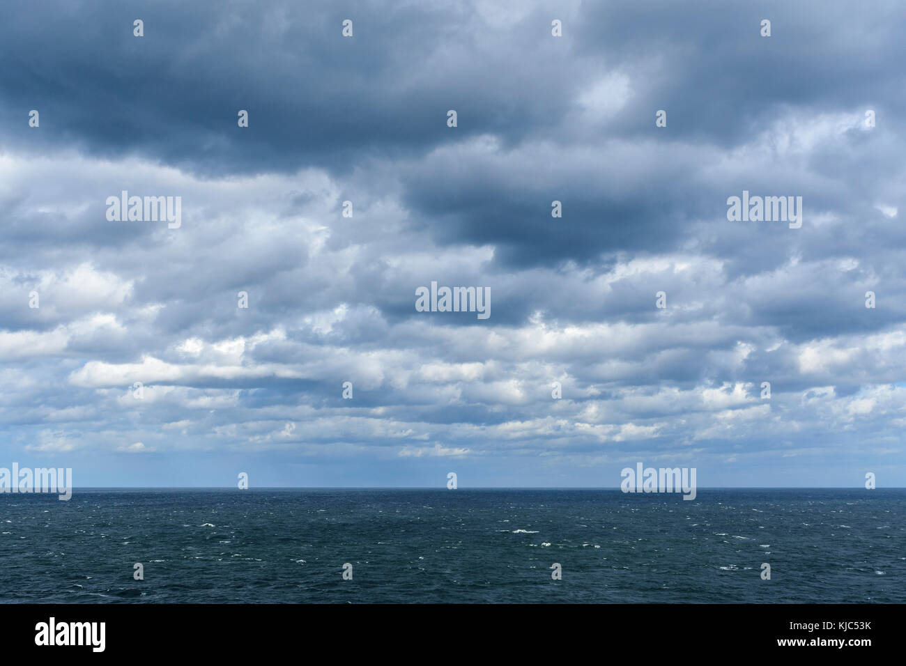 Nimbostratus clouds forming over the choppy North Sea, United Kingdom ...