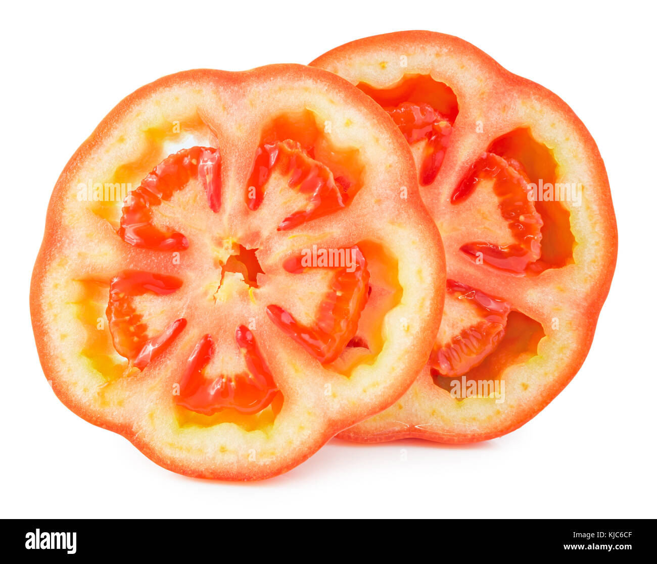 Sliced tomato isolated on white background. Detail of rounded cutted ...
